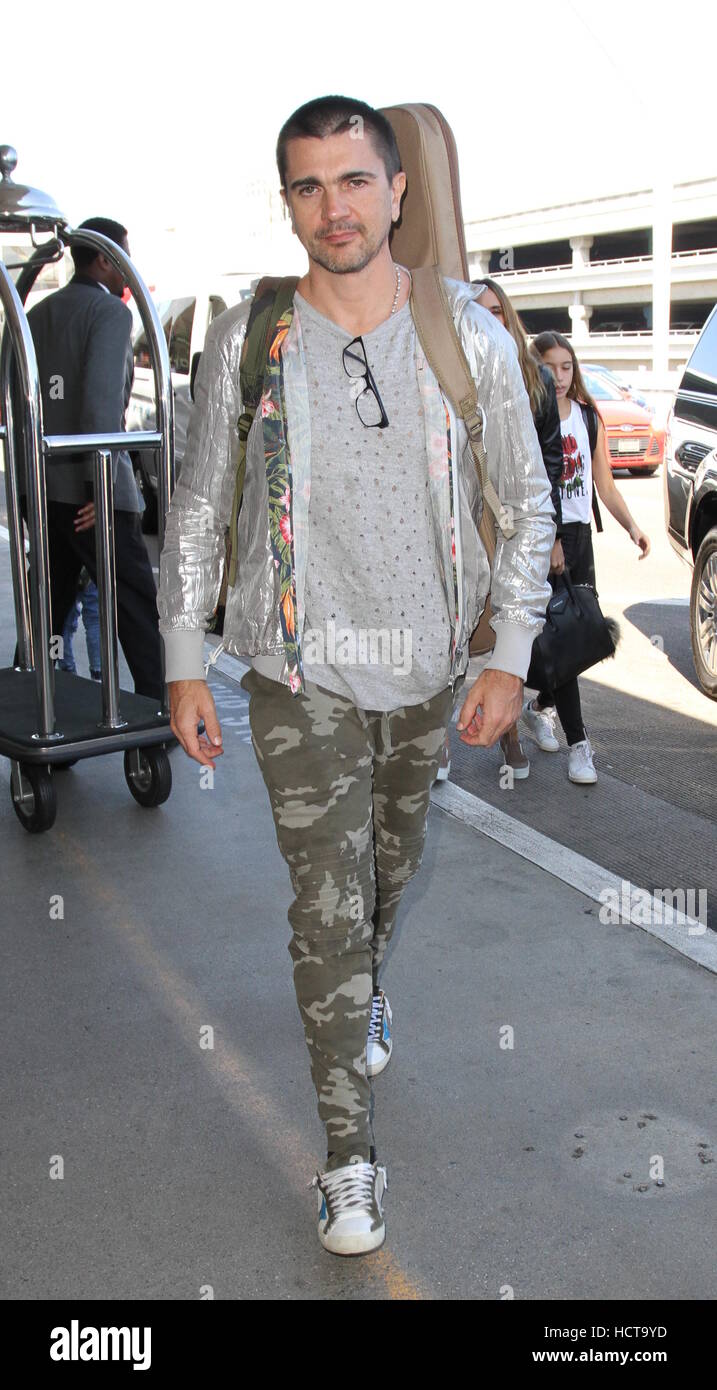 Juanes and family at Los Angeles International Airport (LAX) Featuring ...