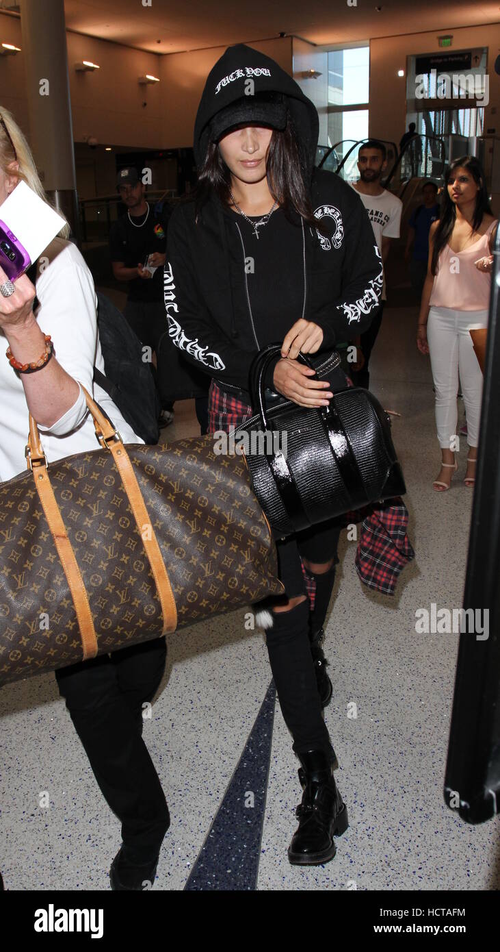 Bella Hadid arrives at Los Angeles International Airport (LAX) with her ...