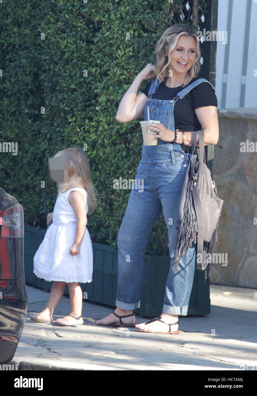 Beverley Mitchell outside Au Fudge restaurant with her daughter Kenzie ...