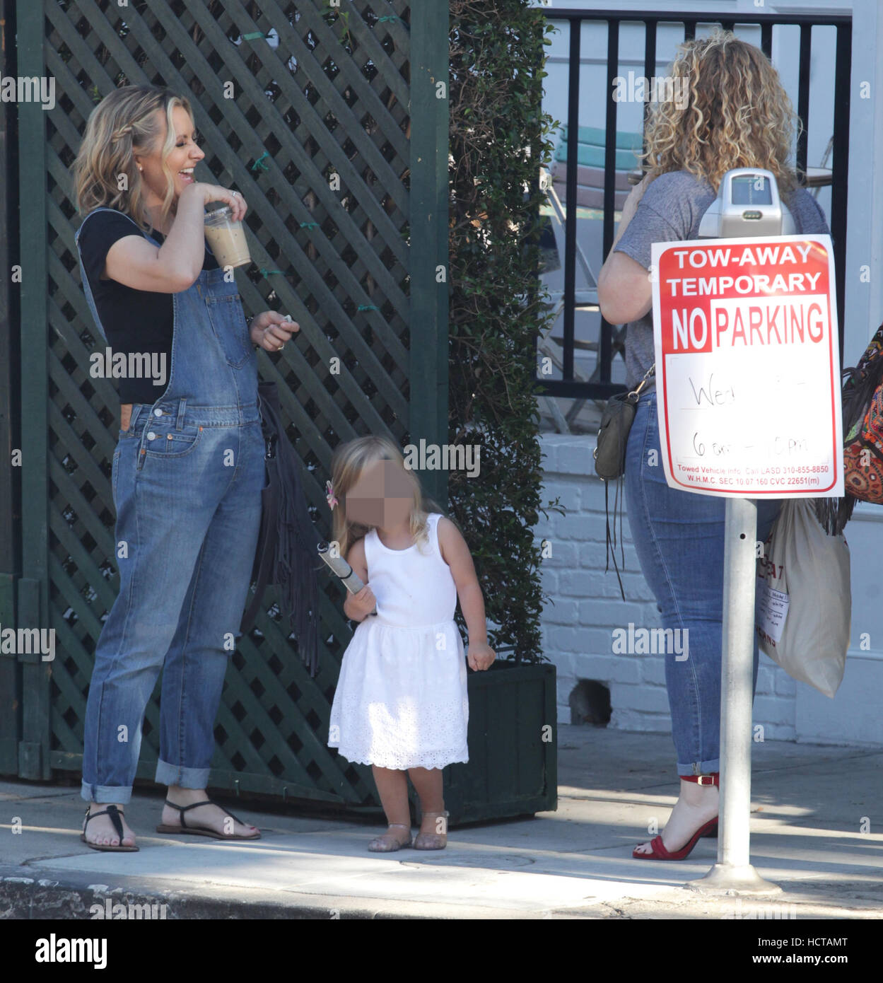 Beverley Mitchell outside Au Fudge restaurant with her daughter Kenzie ...