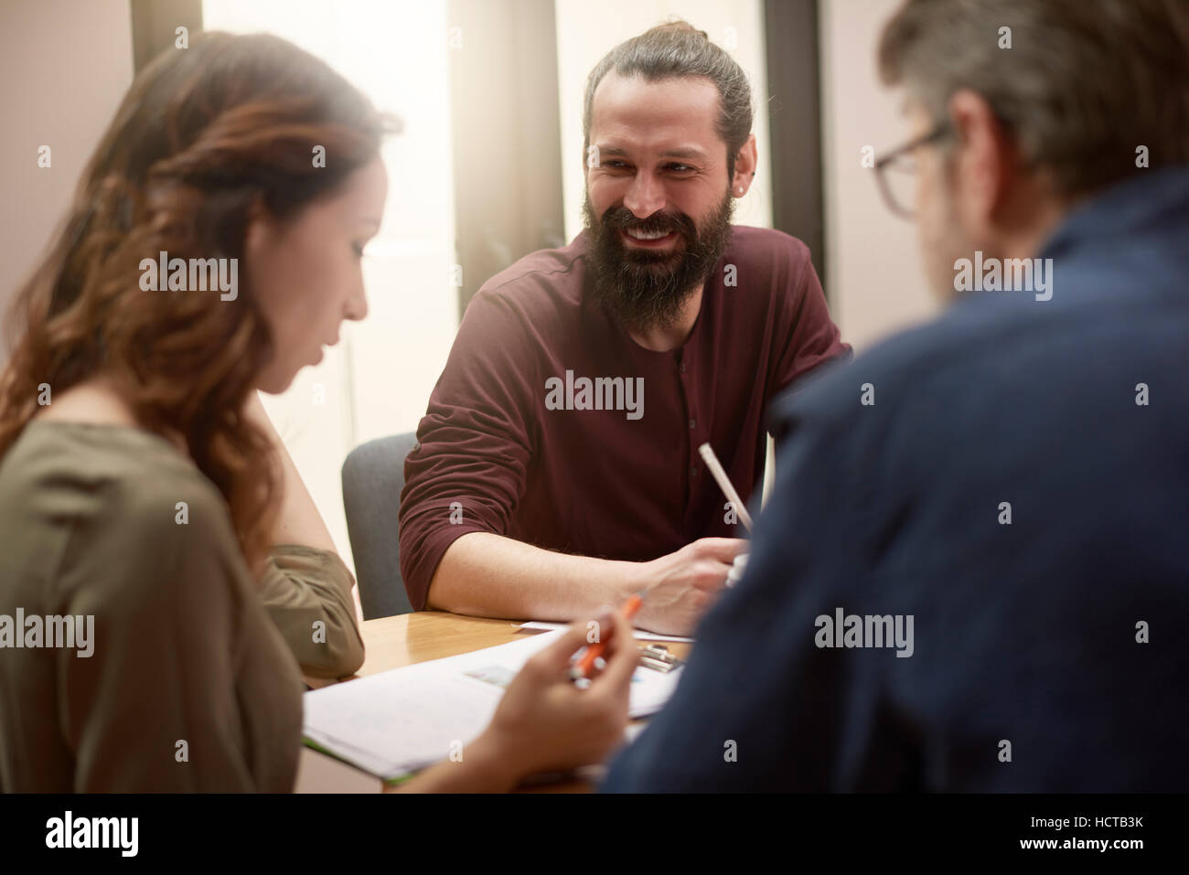 Creative people working together Stock Photo - Alamy