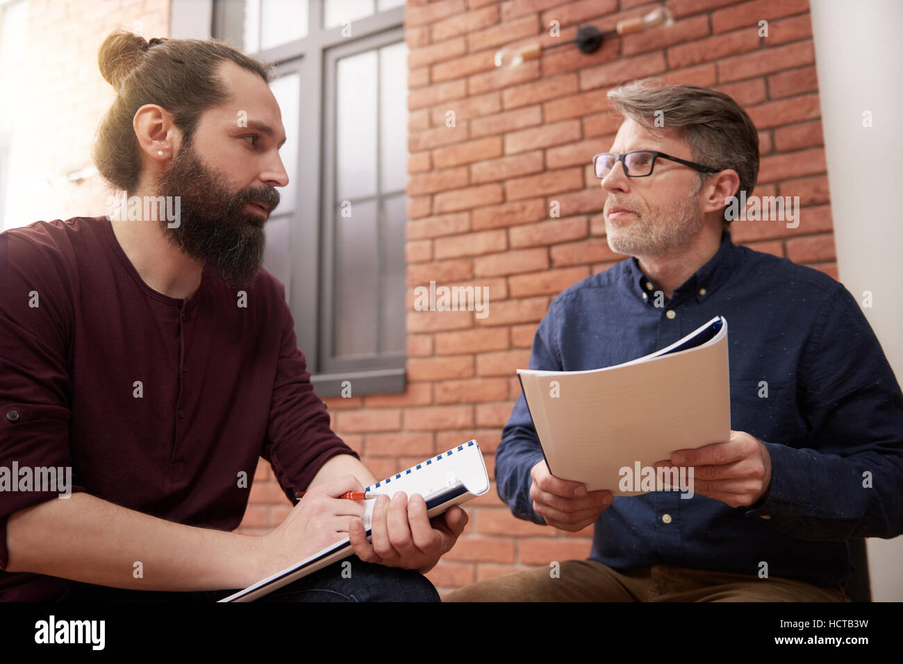 Men thinking about new strategy Stock Photo - Alamy