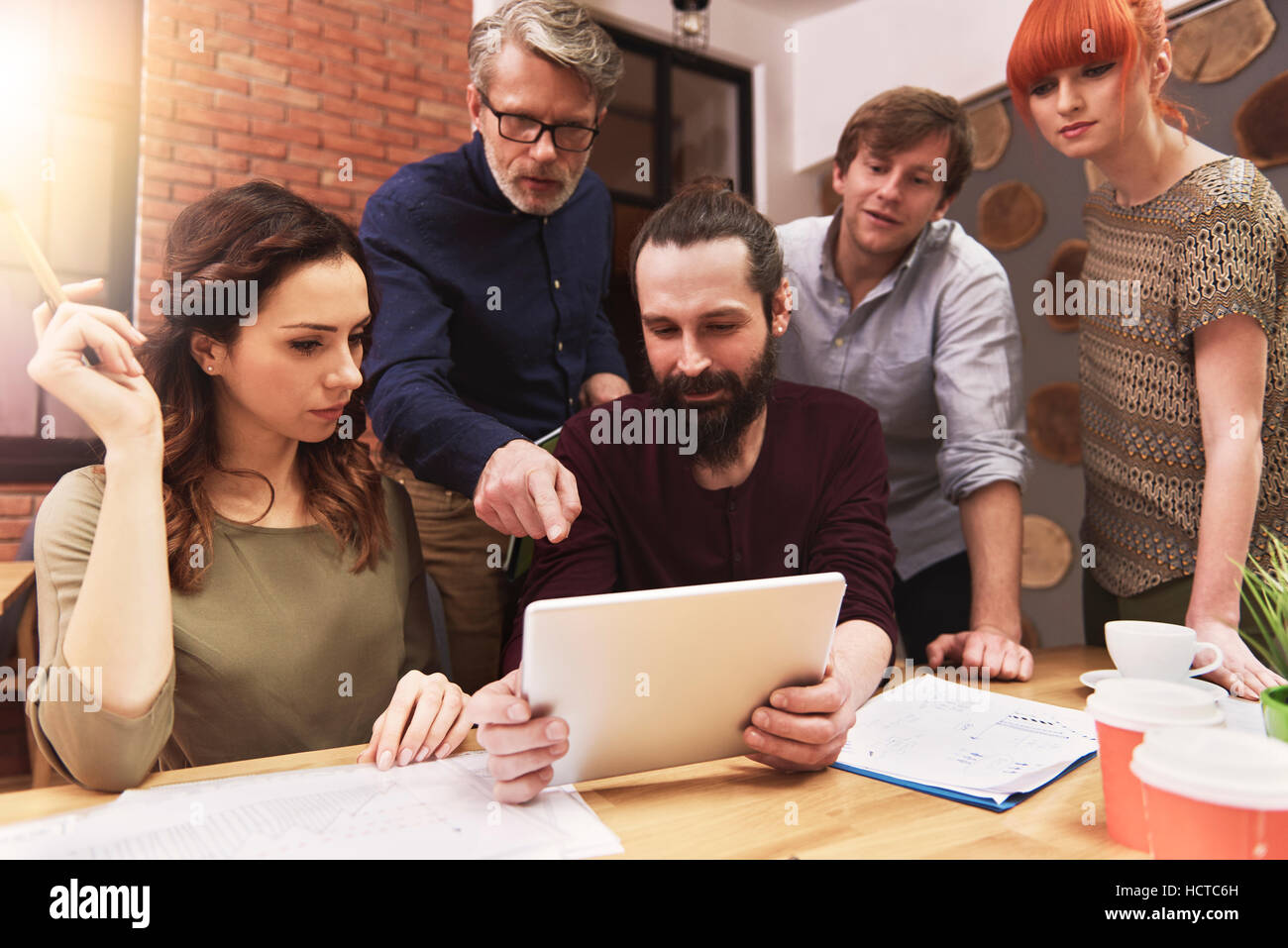 Looking on surprising result of work Stock Photo - Alamy