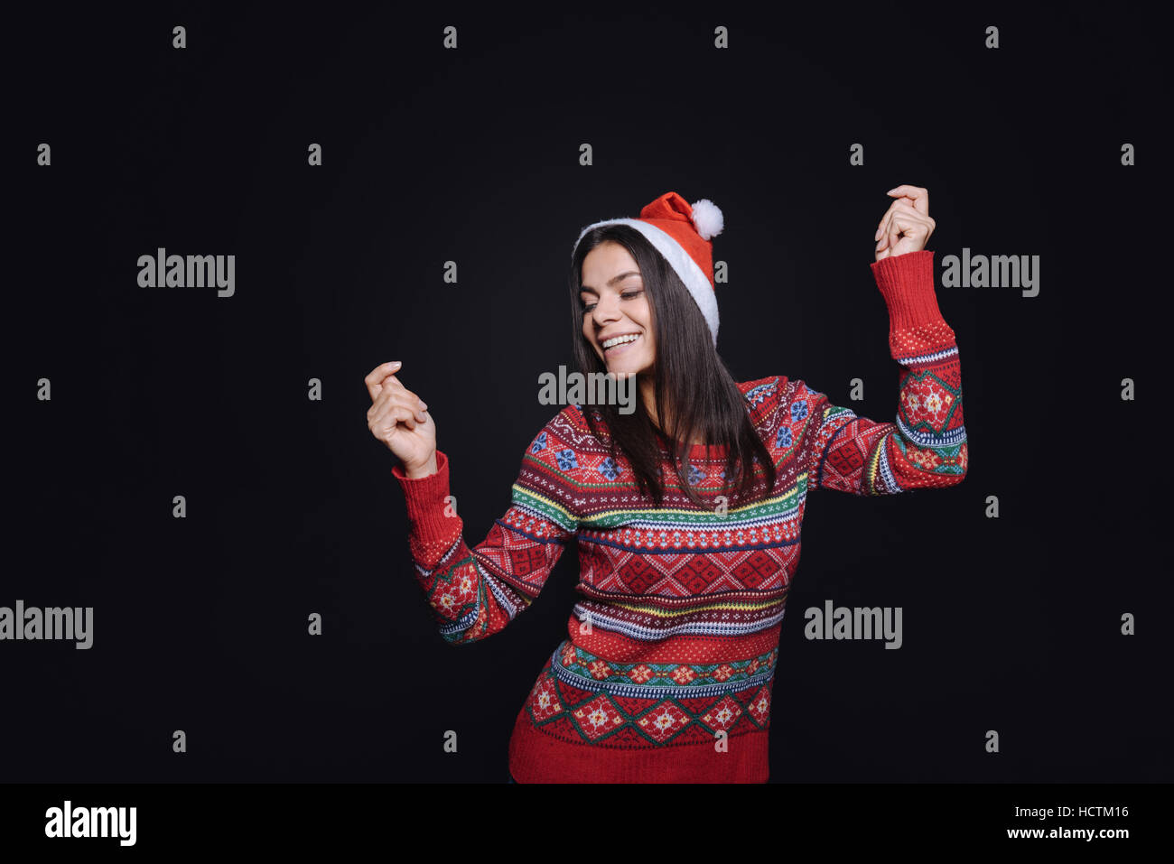 Joyful girl dancing in the studio Stock Photo - Alamy