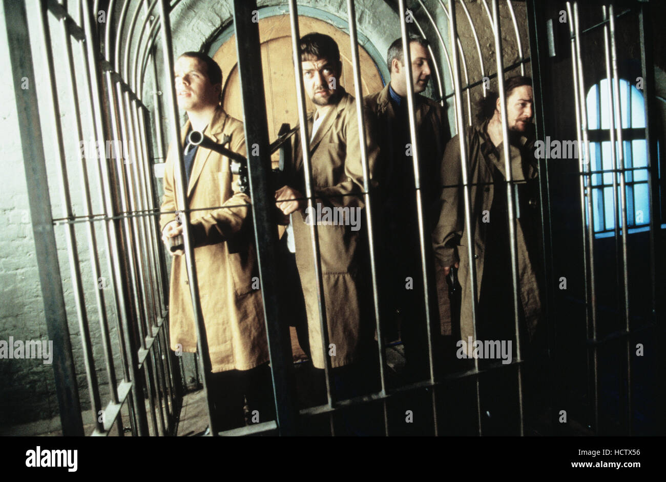 LOCK, STOCK AND TWO SMOKING BARRELS, from left: Tony McMahon, Ronnie ...