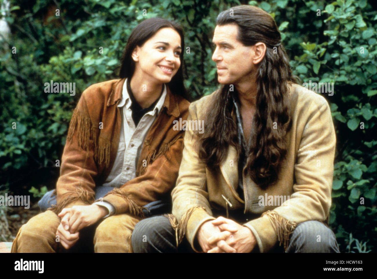 GREY OWL, from left: Annie Galipeau, Pierce Brosnan, 1999. ©Largo ...