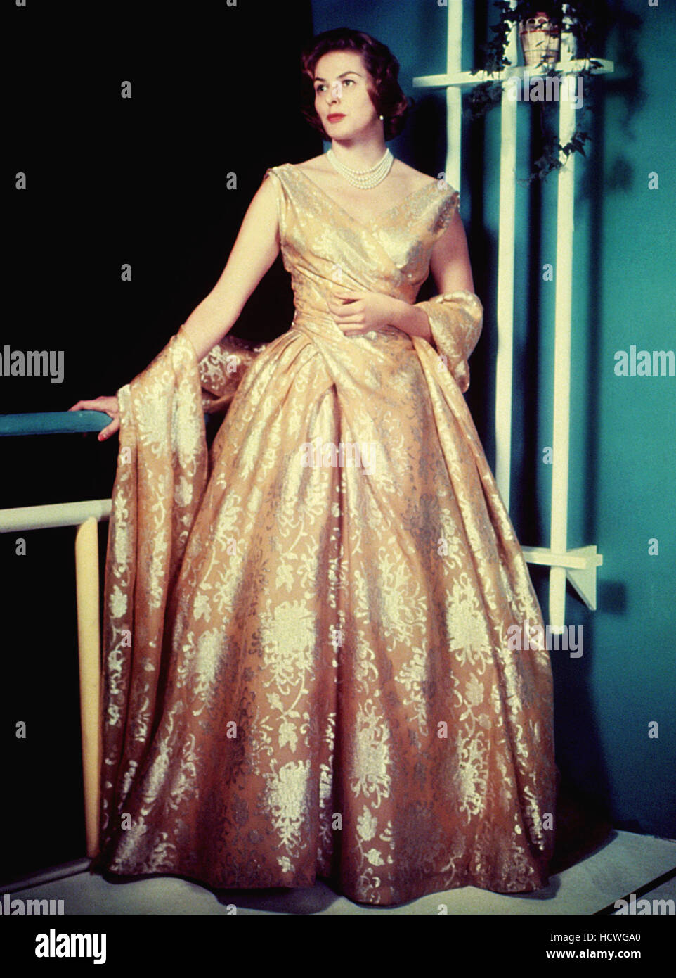 Gold brocade dress hi-res stock photography and images - Alamy