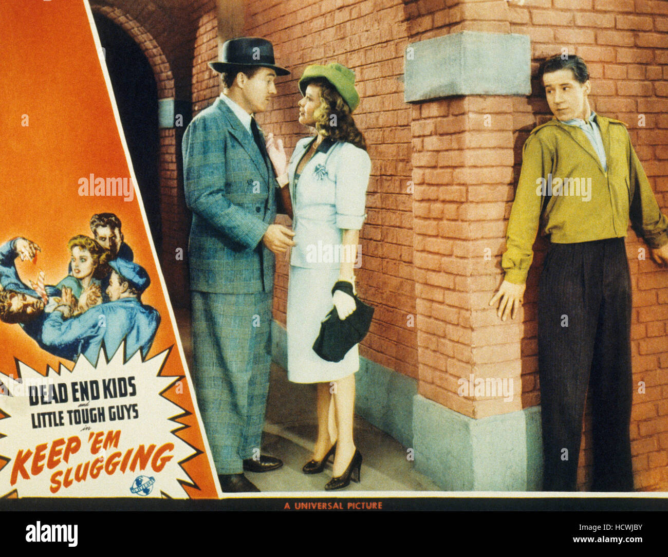 KEEP 'EM SLUGGING, from left, Milburn Stone, Evelyn Ankers, Bobby ...