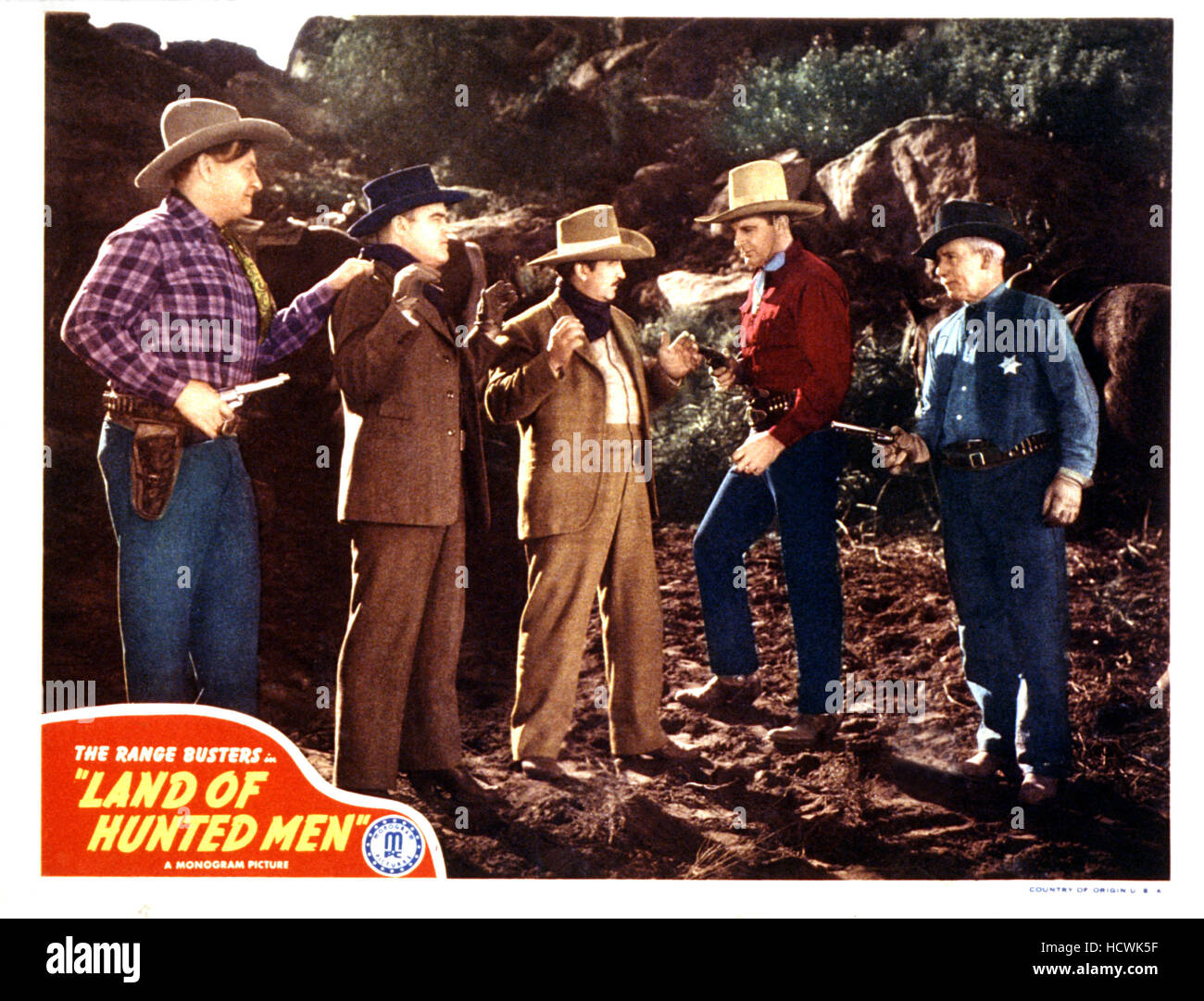LAND OF HUNTED MEN, from left: Max Terhune, John Merton, Charles King ...