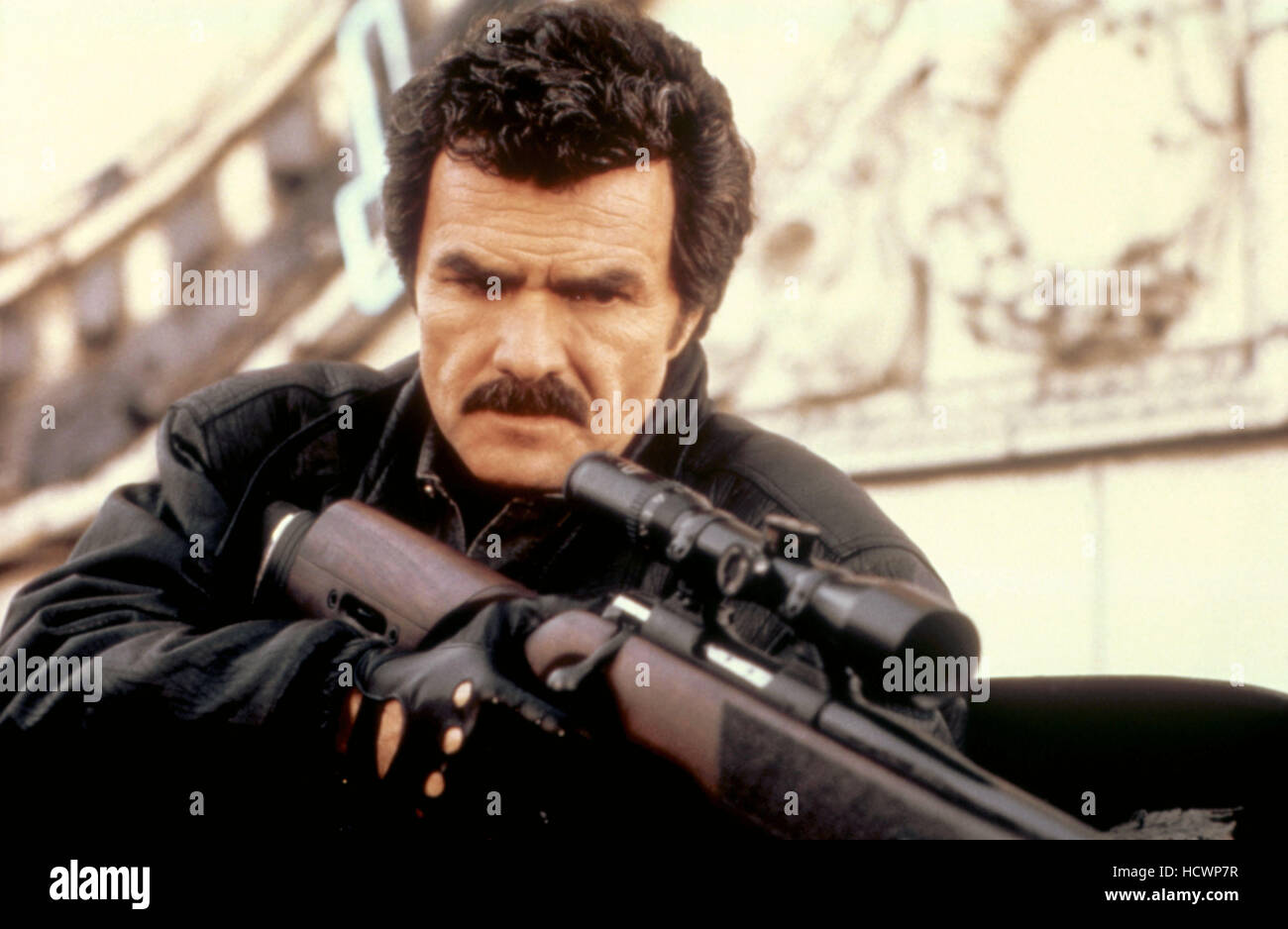 MALONE, Burt Reynolds, 1987, (c)Orion Pictures/courtesy Everett ... MALONE, Burt Reynolds, 1987, (c)Orion Pictures/courtesy Everett ...
