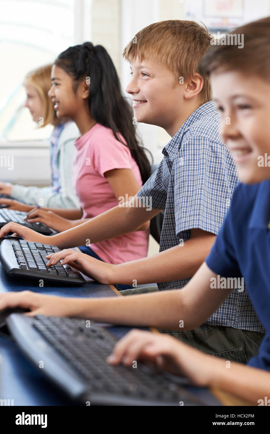 Elementary Pupils In Computer Class Stock Photo - Alamy