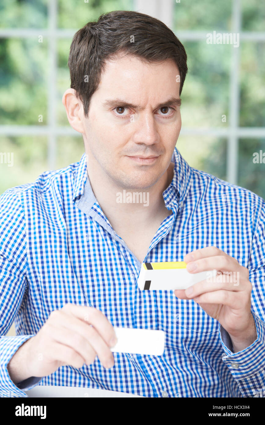 Man reading instructions hi-res stock photography and images - Alamy