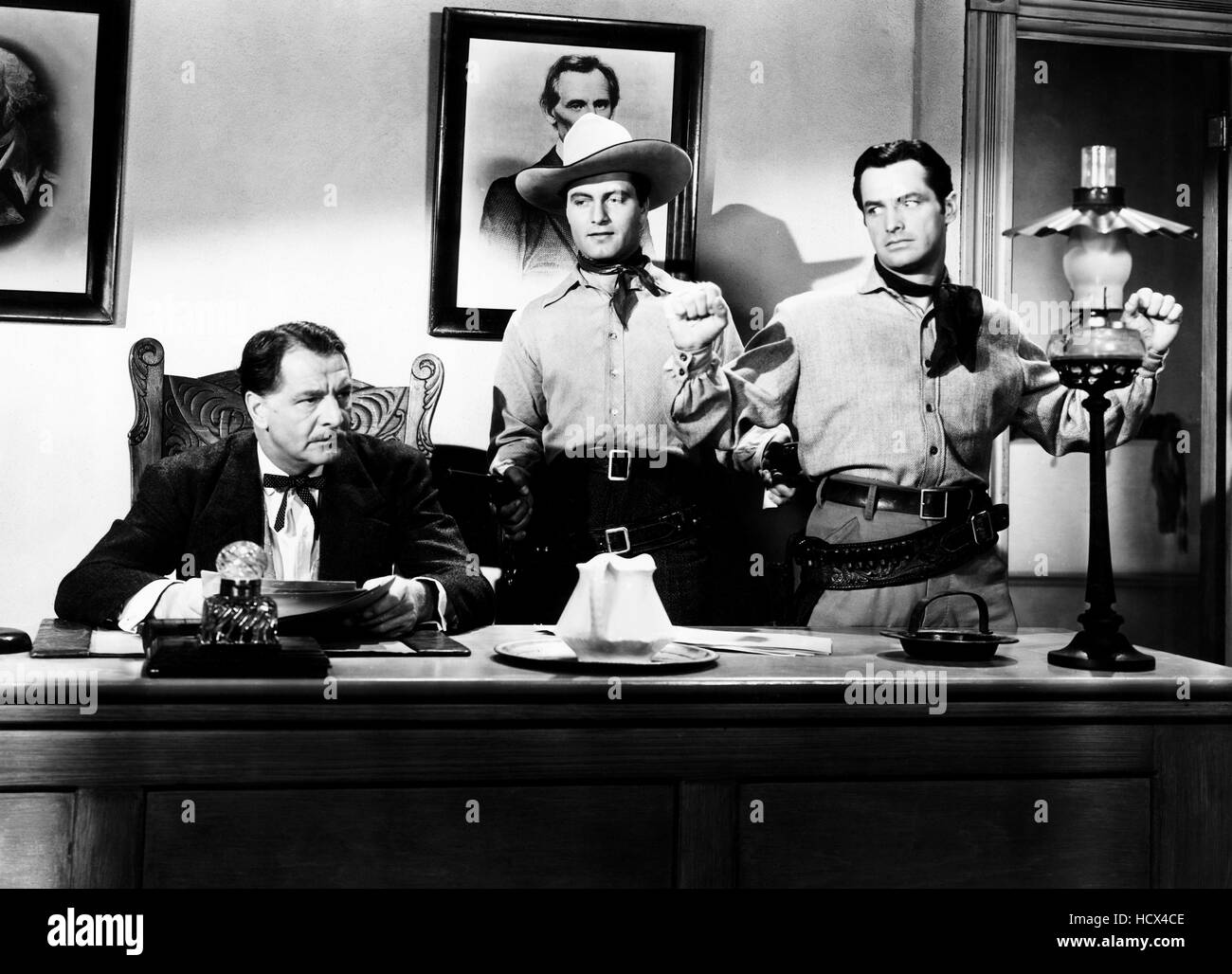 RIDERS OF THE PURPLE SAGE, from left, Robert Barrat, George Montgomery ...