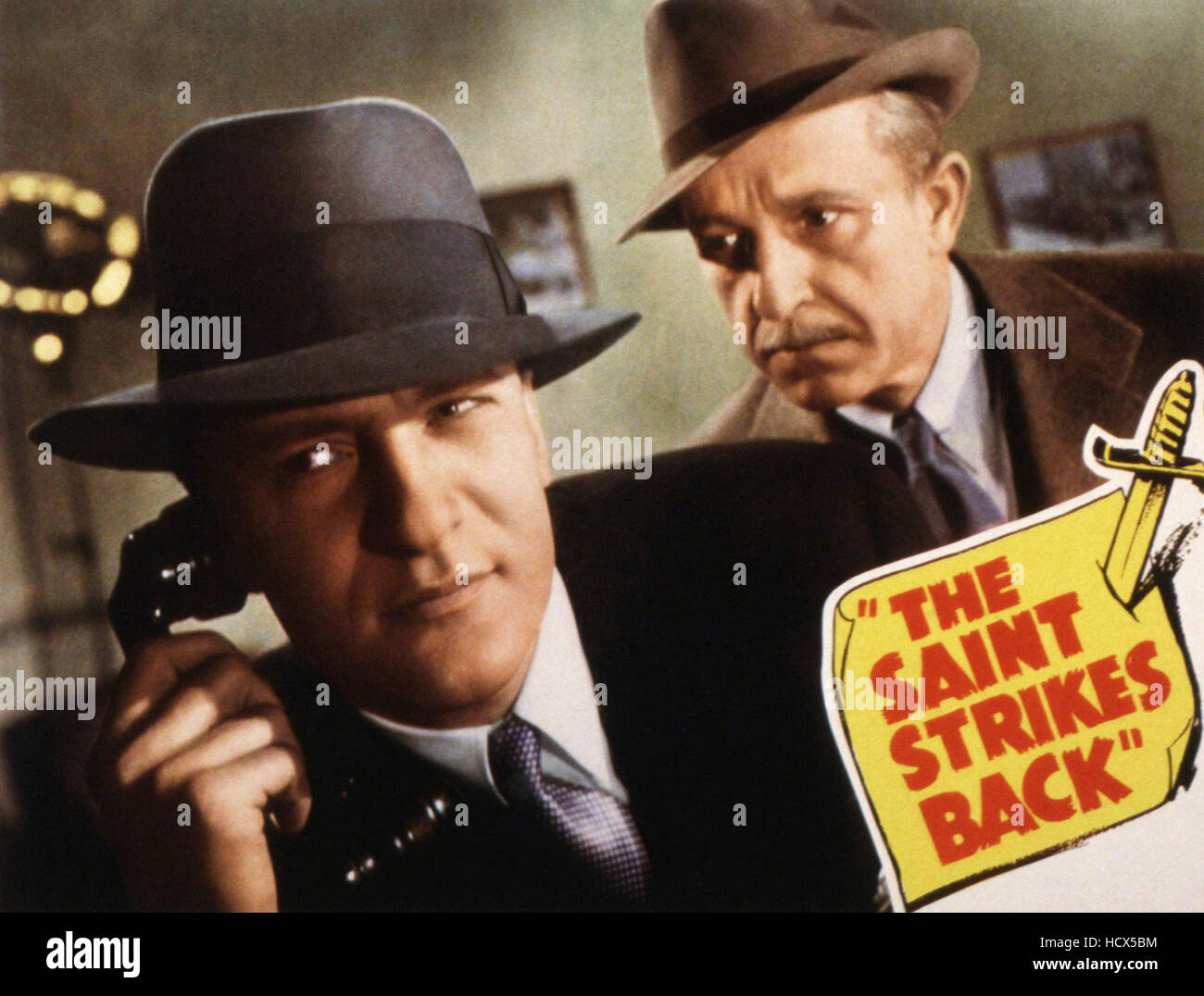 THE SAINT STRIKES BACK, George Sanders, Jonathan Hale, 1939 Stock Photo ...