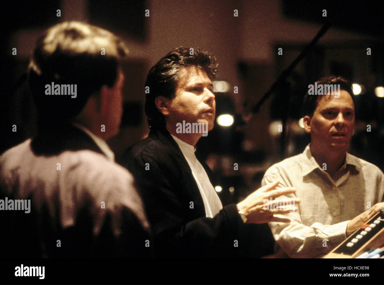 POCAHONTAS, composer Alan Menken (center) at recording session, 1995 ...