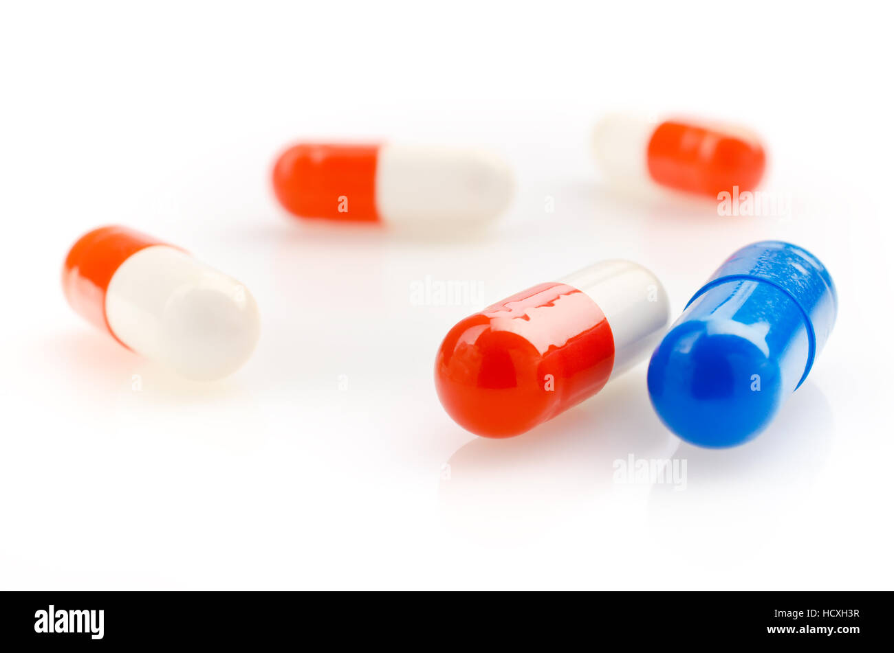 Red and Blue Capsules Stock Photo - Alamy