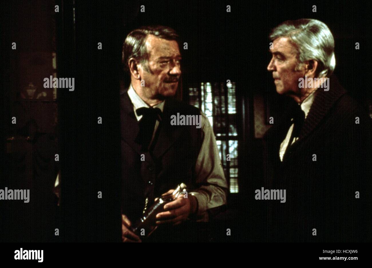 SHOOTIST, THE, John Wayne, James Stewart, 1976 Stock Photo - Alamy