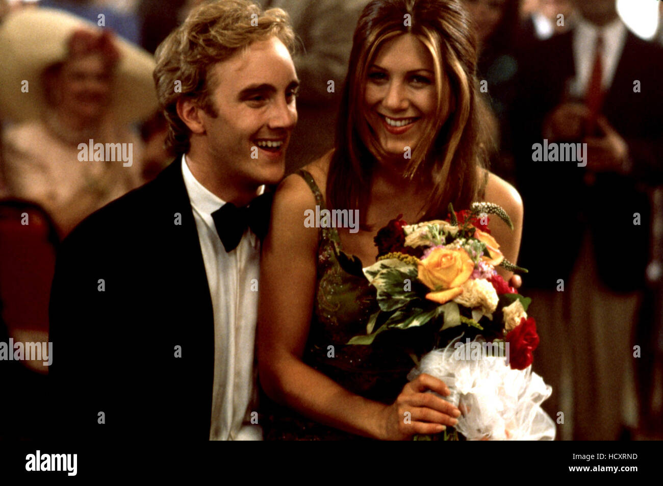 PICTURE PERFECT, Jay Mohr, Jennifer Aniston, 1997, happy with flowers ...