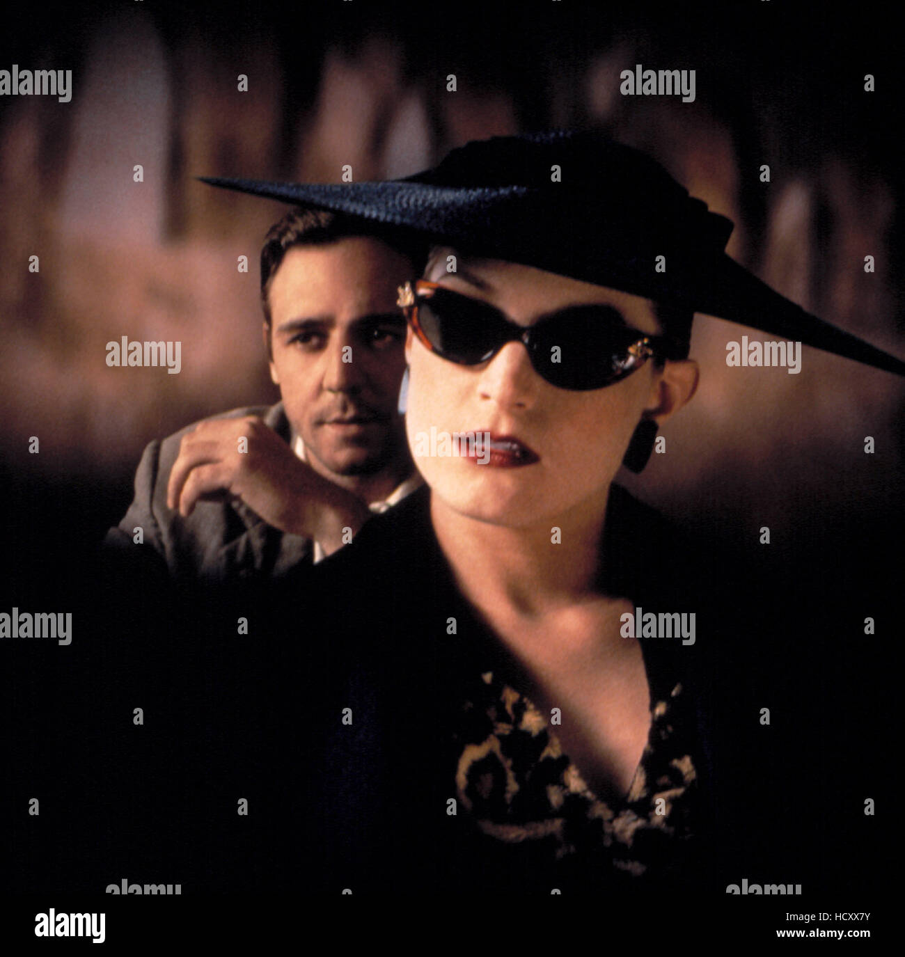 ROUGH MAGIC, Russell Crowe, Bridget Fonda, 1995 Stock Photo - Alamy