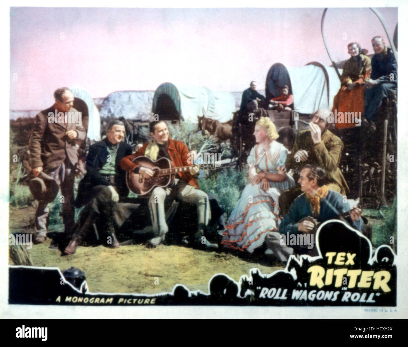 ROLL WAGONS ROLL, Tex Ritter (center), 1940 Stock Photo - Alamy