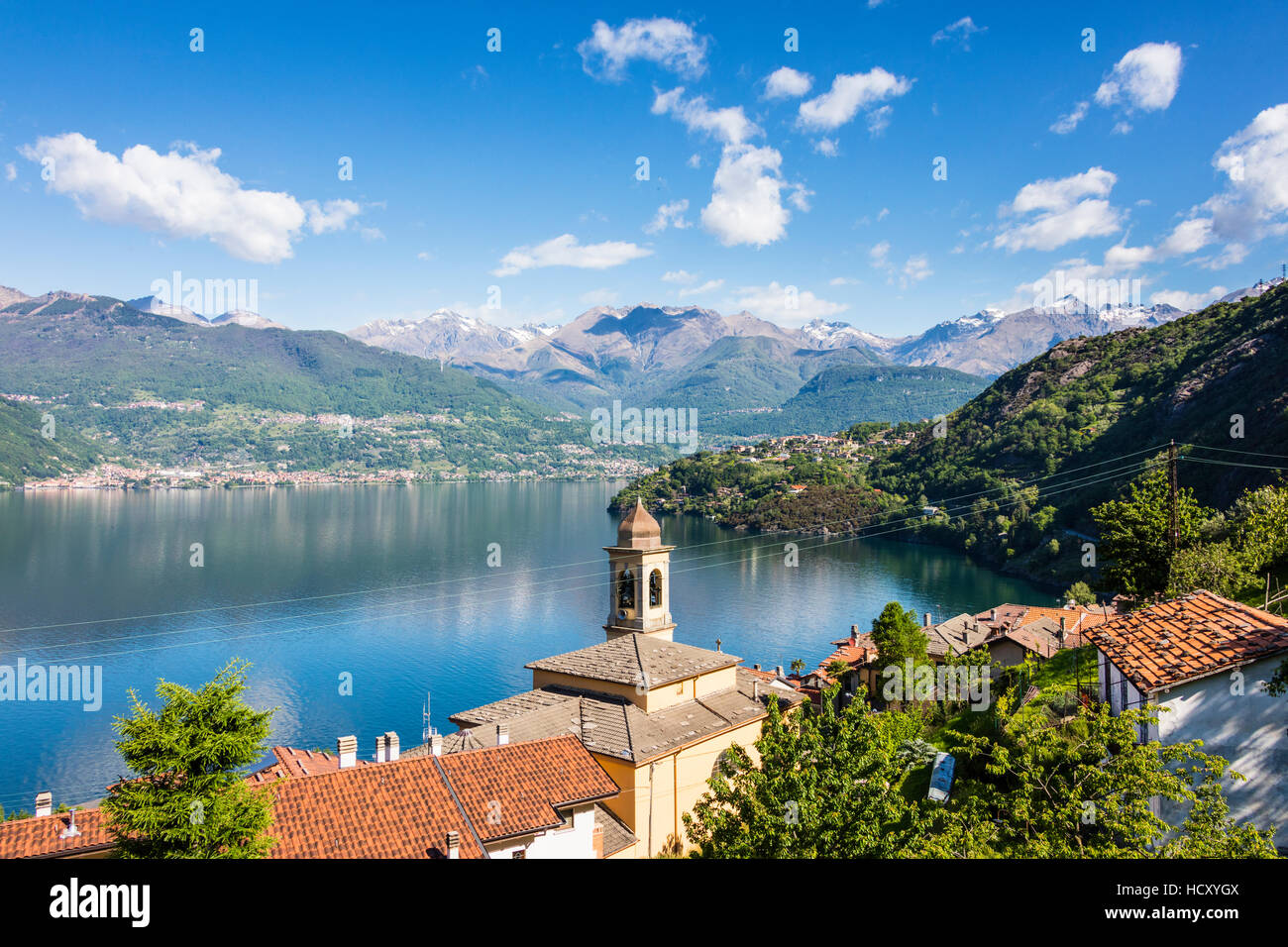 View of the bell tower and village of Dorio, Lake Como, Province of ...