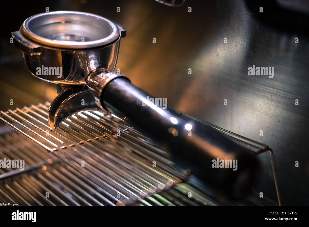 Espresso machine coffee ground holder Stock Photo - Alamy