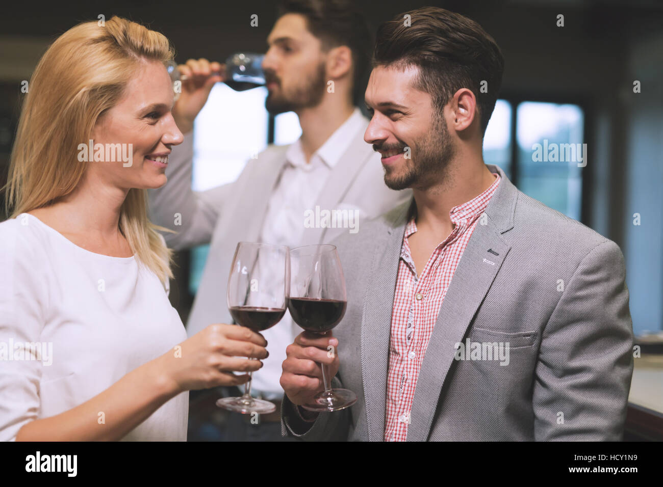 People tasting wine at winery Stock Photo - Alamy