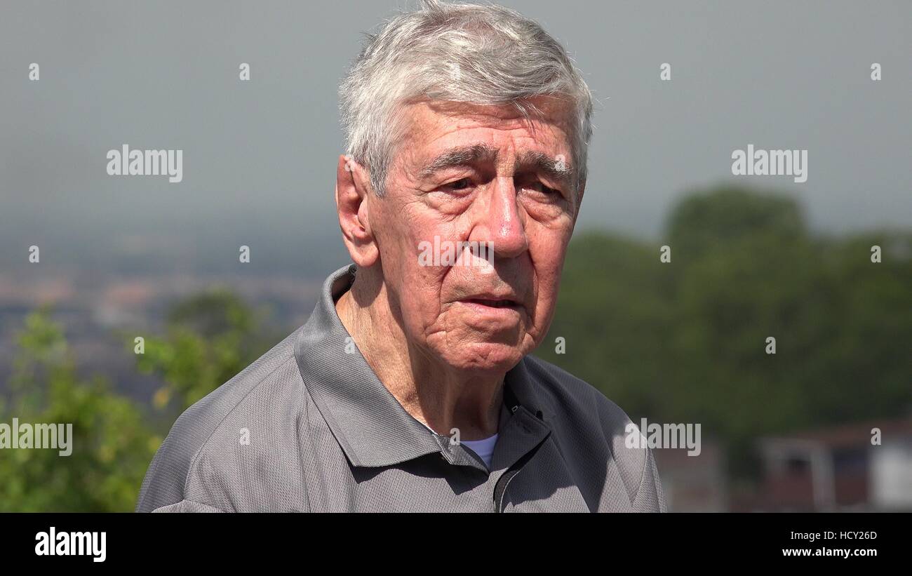 Confused Old Man Standing Up Stock Photo - Alamy