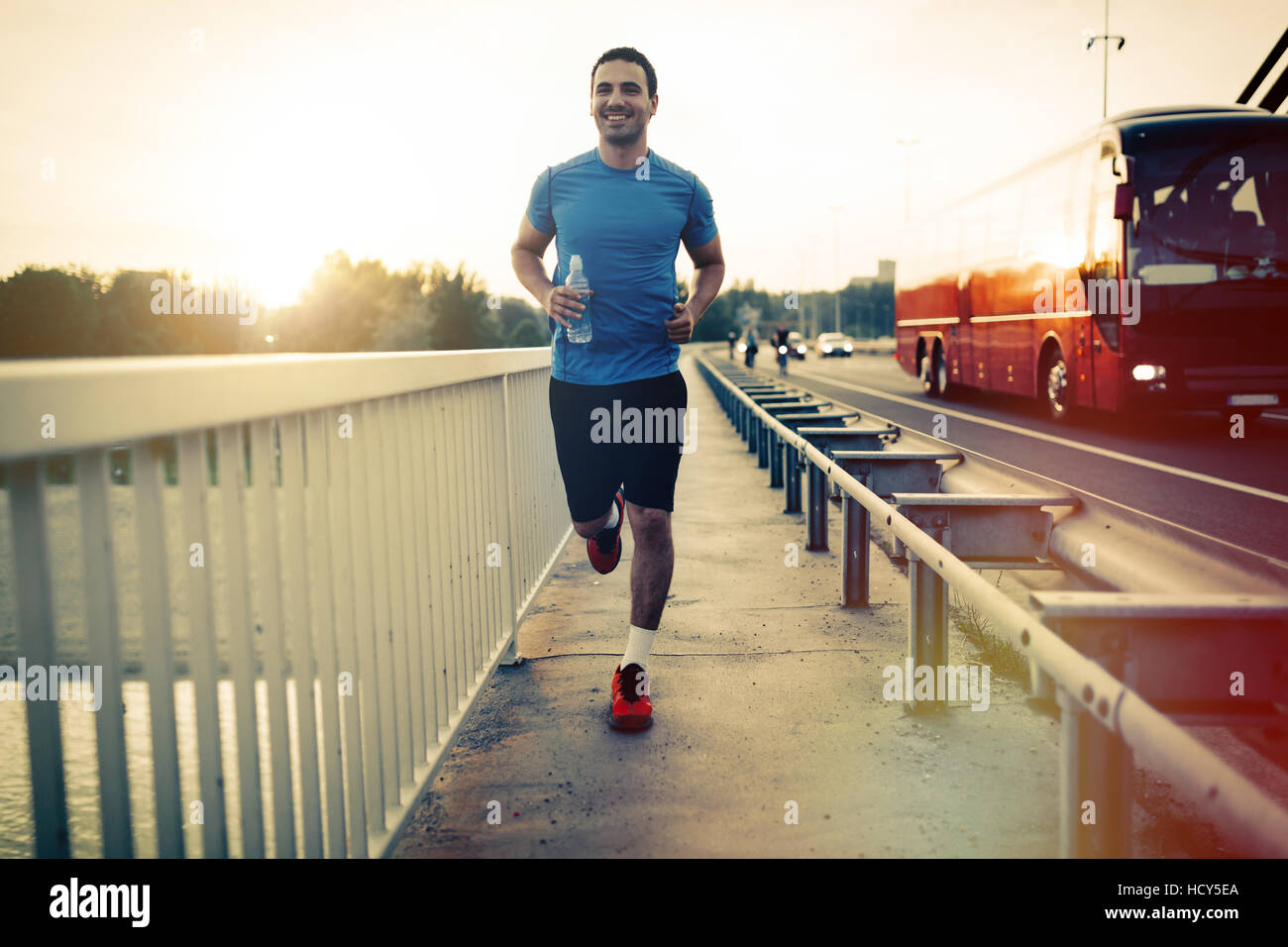 Fit athlete running outdoors to stay healthy Stock Photo - Alamy