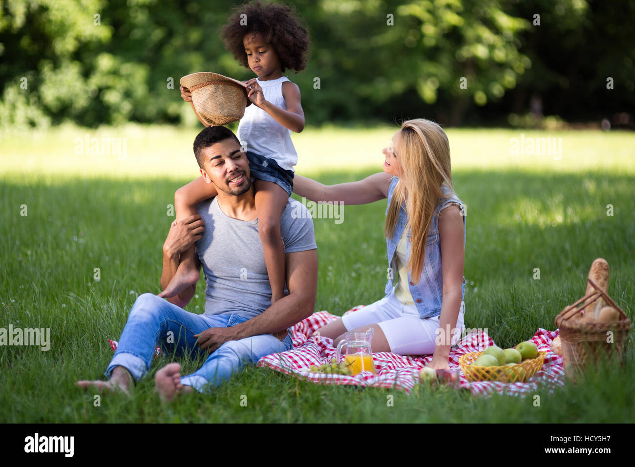 Family having fun and picnic in nature Stock Photo - Alamy