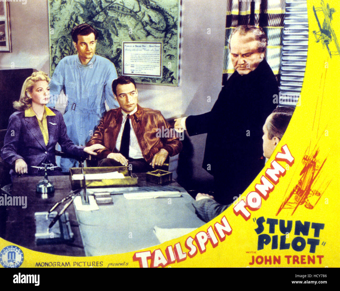 STUNT PILOT, seated l-r: Marjorie Reynolds, John Trent on lobbycard, 1939 Stock Photo - Alamy