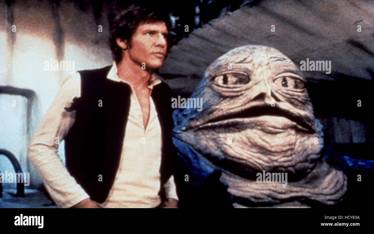 STAR WARS, (aka STAR WARS: EPISODE IV - A NEW HOPE), from left: Harrison Ford, Jabba the Hutt ...