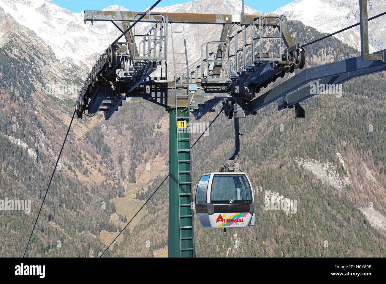 Dolomites , Italy - December 23, 2015: Nebelhorn cable car moving up ...