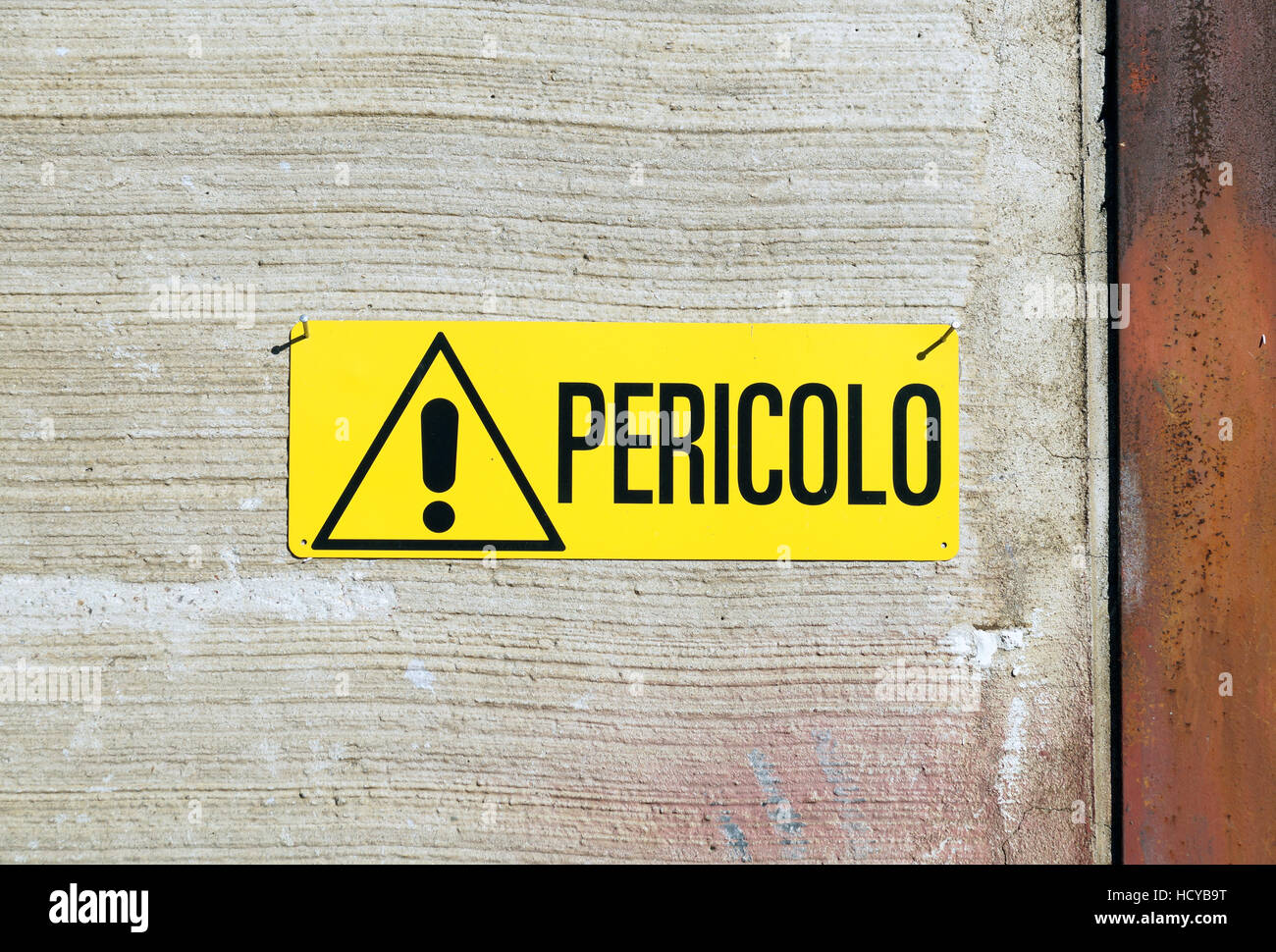 danger warning sign on the wall Stock Photo - Alamy