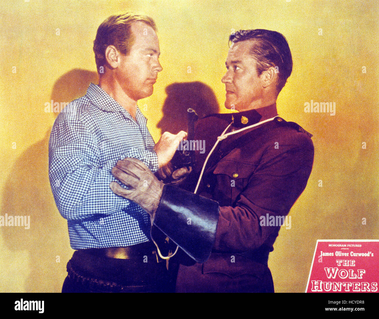 THE WOLF HUNTERS, l-r: Edward Norris, Kirby Grant on lobbycard, 1949 ...