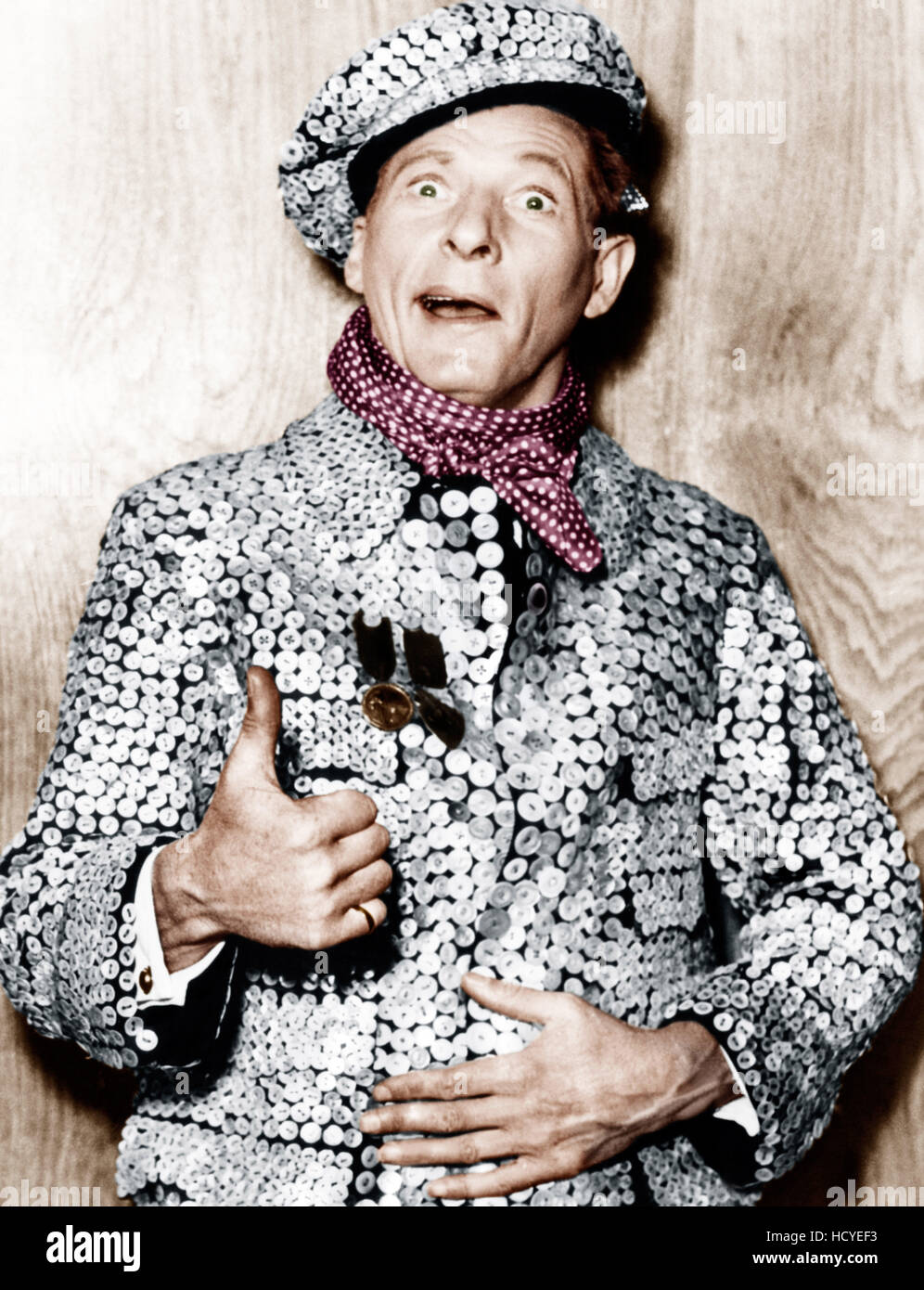 DANNY KAYE in a pearl button outfit made for him by London fans prior ...
