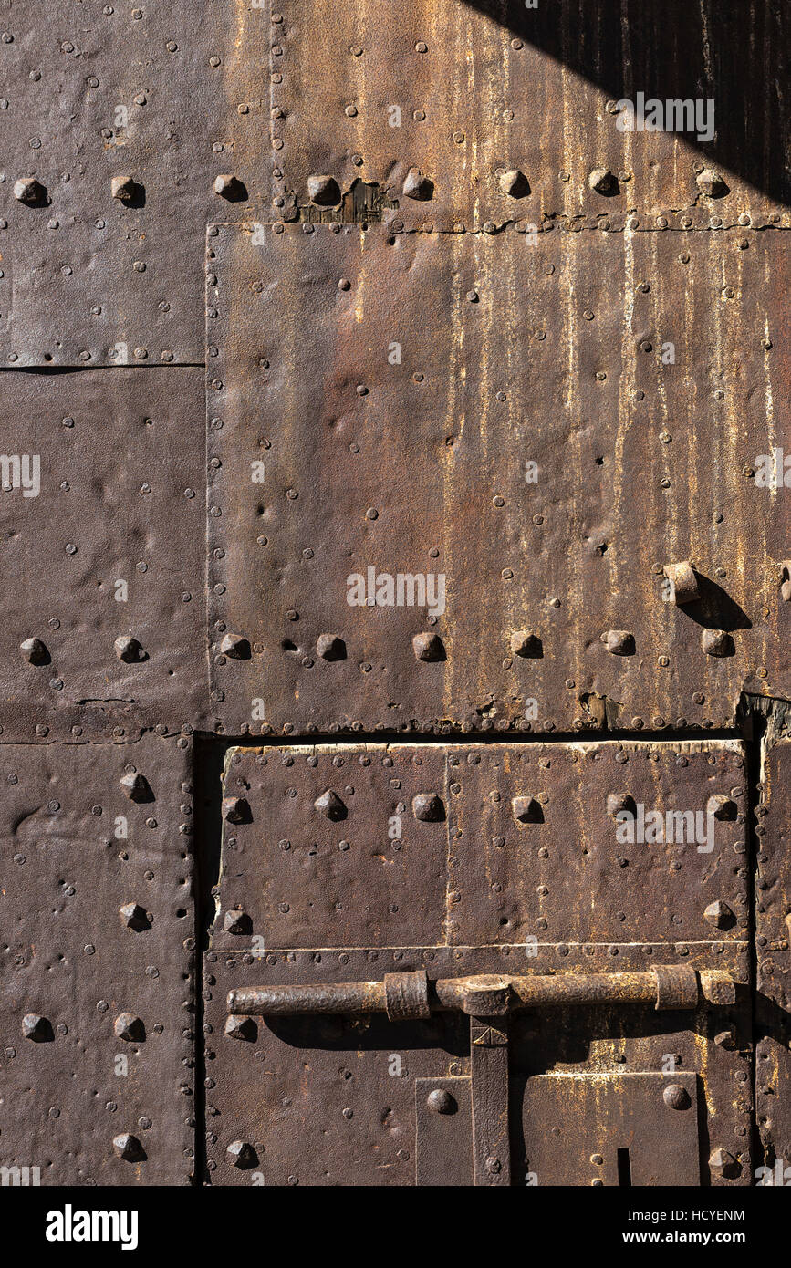 Lock on old iron rusty door of a medieval castle as background Stock ...