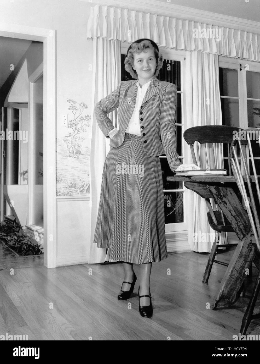 Barbara Bel Geddes, in her dining room, 1948 Stock Photo - Alamy