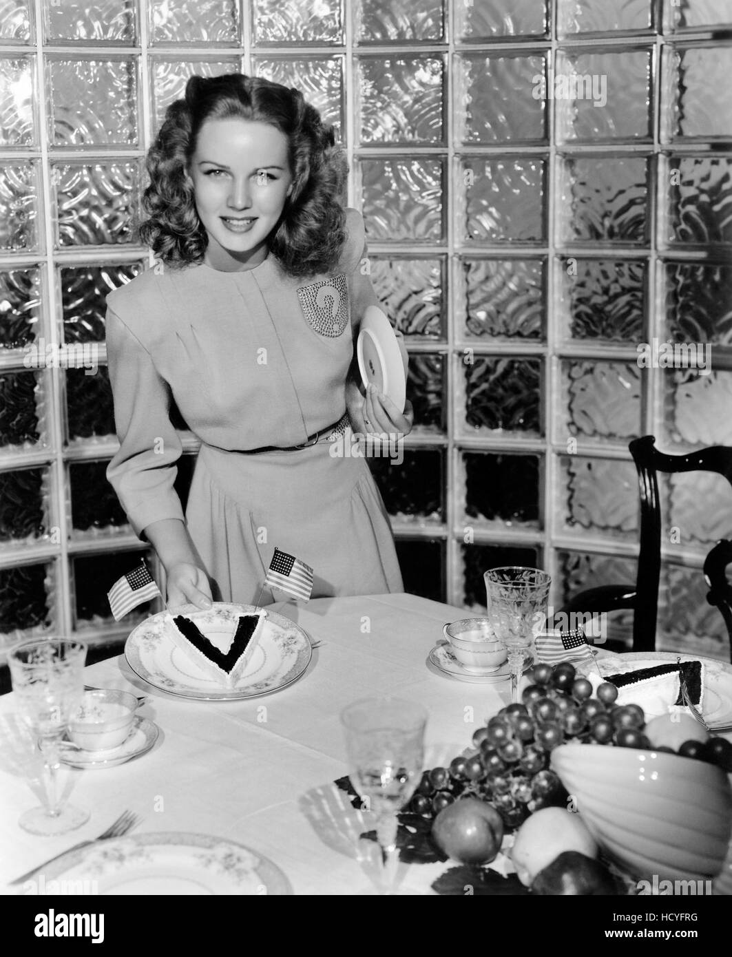 Barbara Britton, with V for Victory cake, 1942 Stock Photo - Alamy