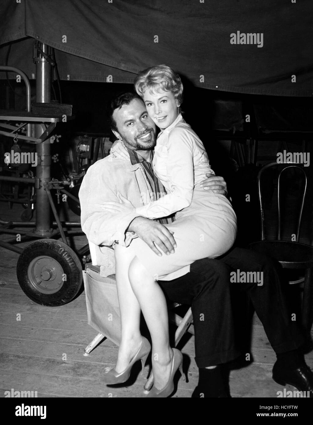 Barbara Eden, sitting on the lap of her first husband, actor Michael ...