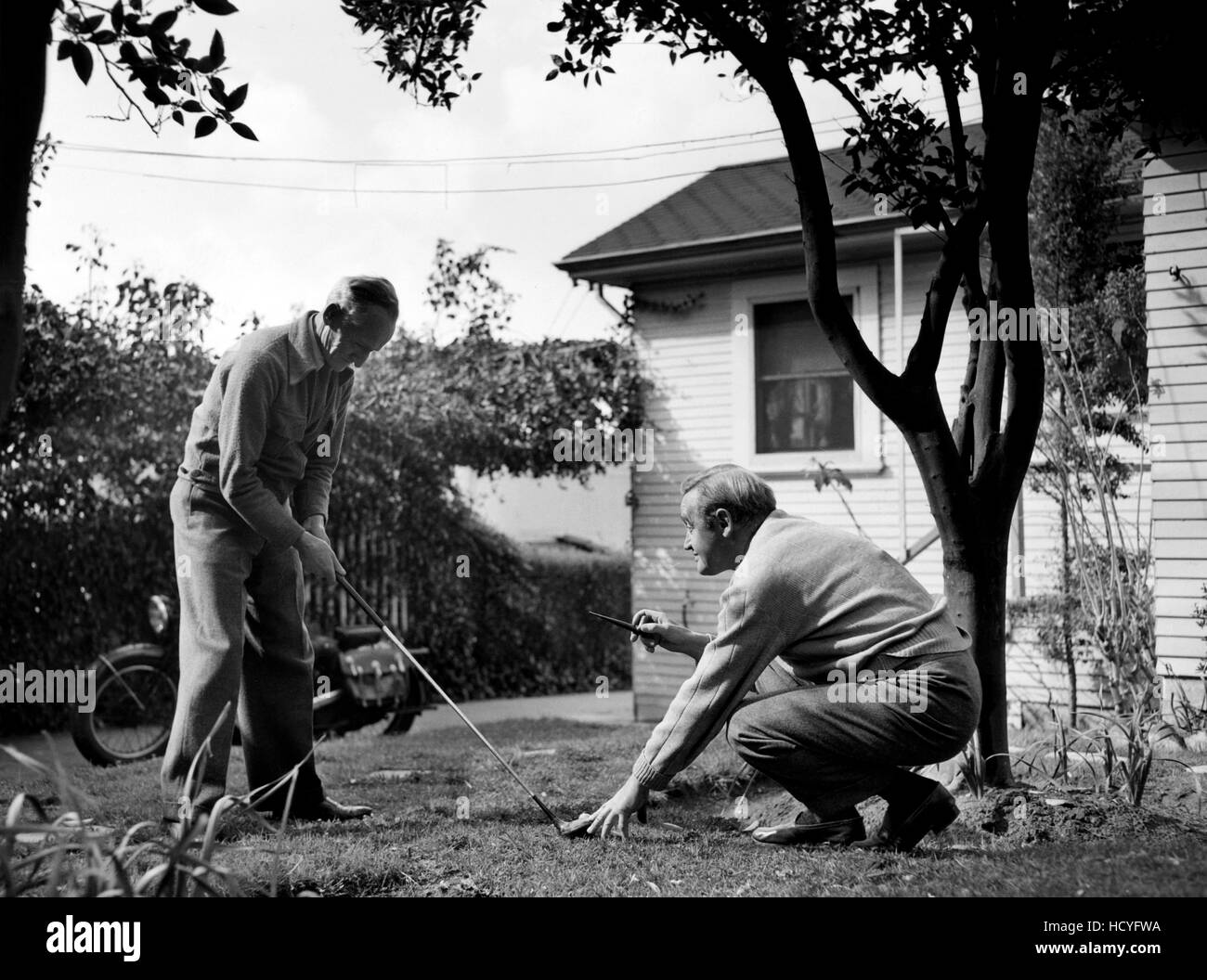 Barry Fitzgerald (right) giving golfing pointers to his movie stand-in ...