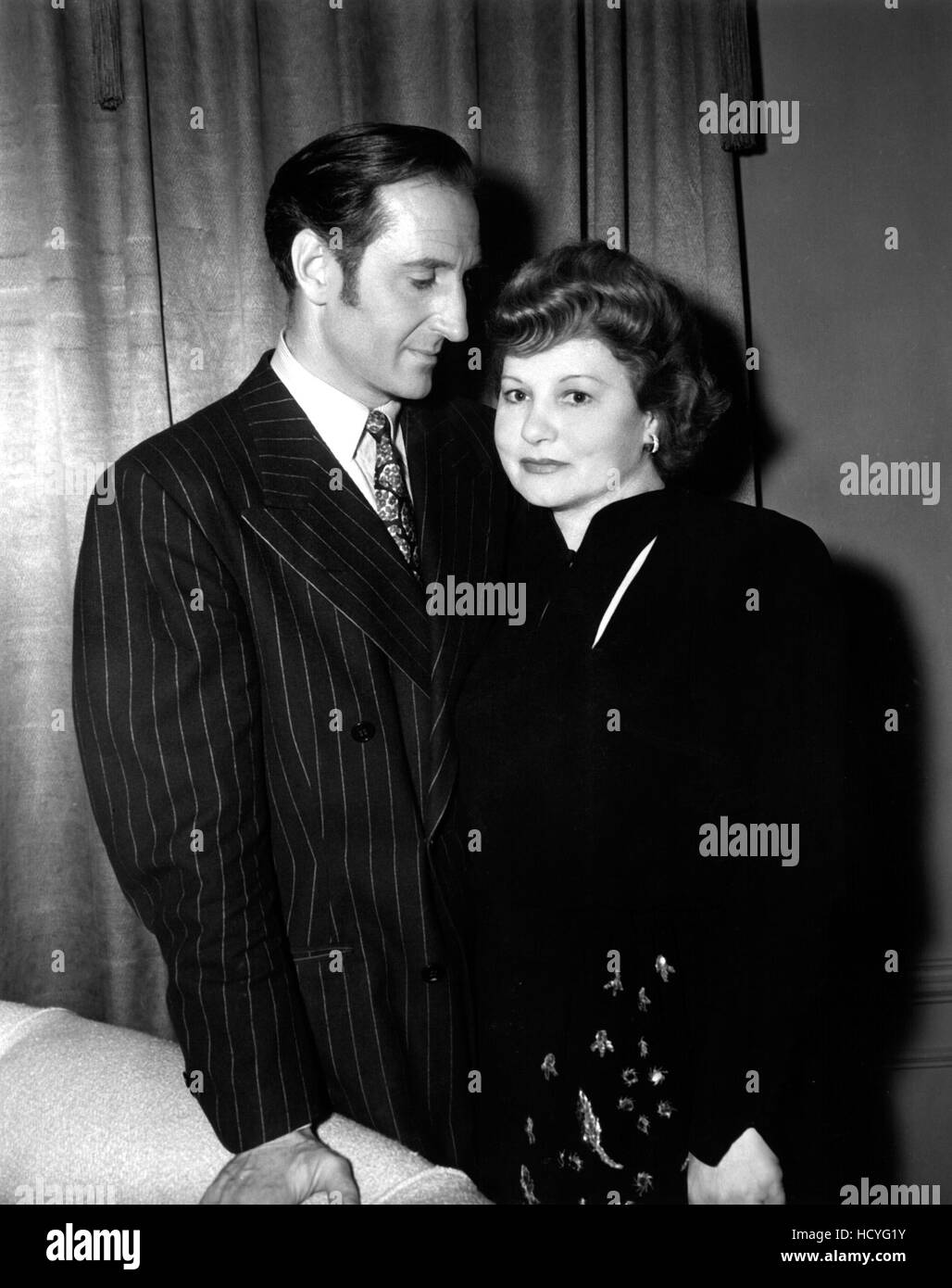 BASIL RATHBONE, and his wife Ouida, celebrate their 17th anniversary ...