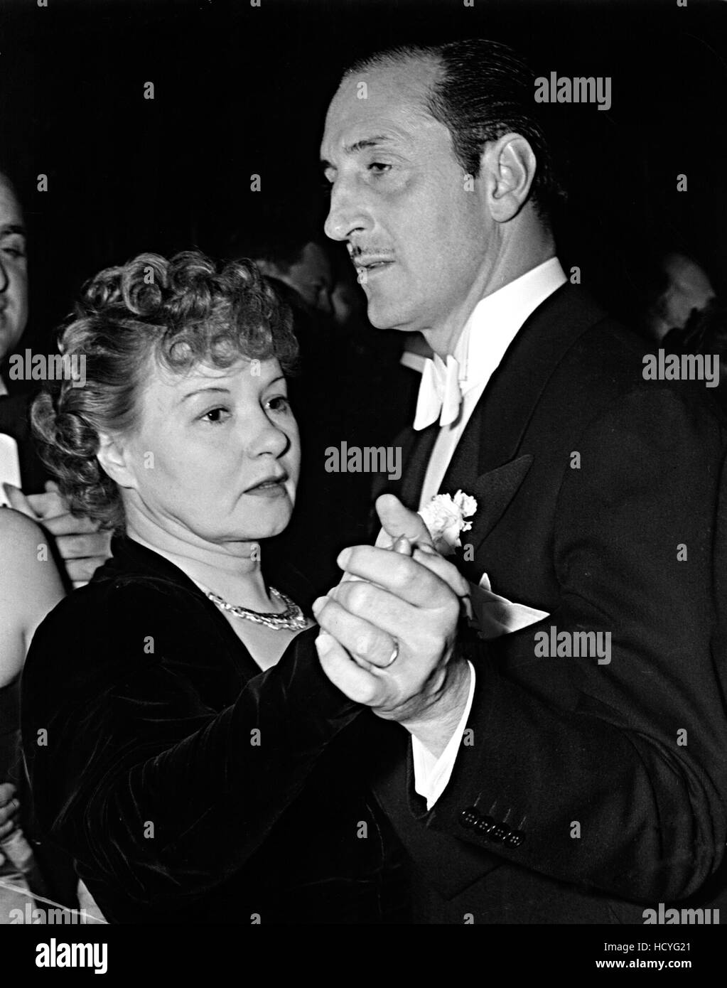 BASIL RATHBONE, and his wife Ouida, dancing at the Coconut Grove, 1/17 ...