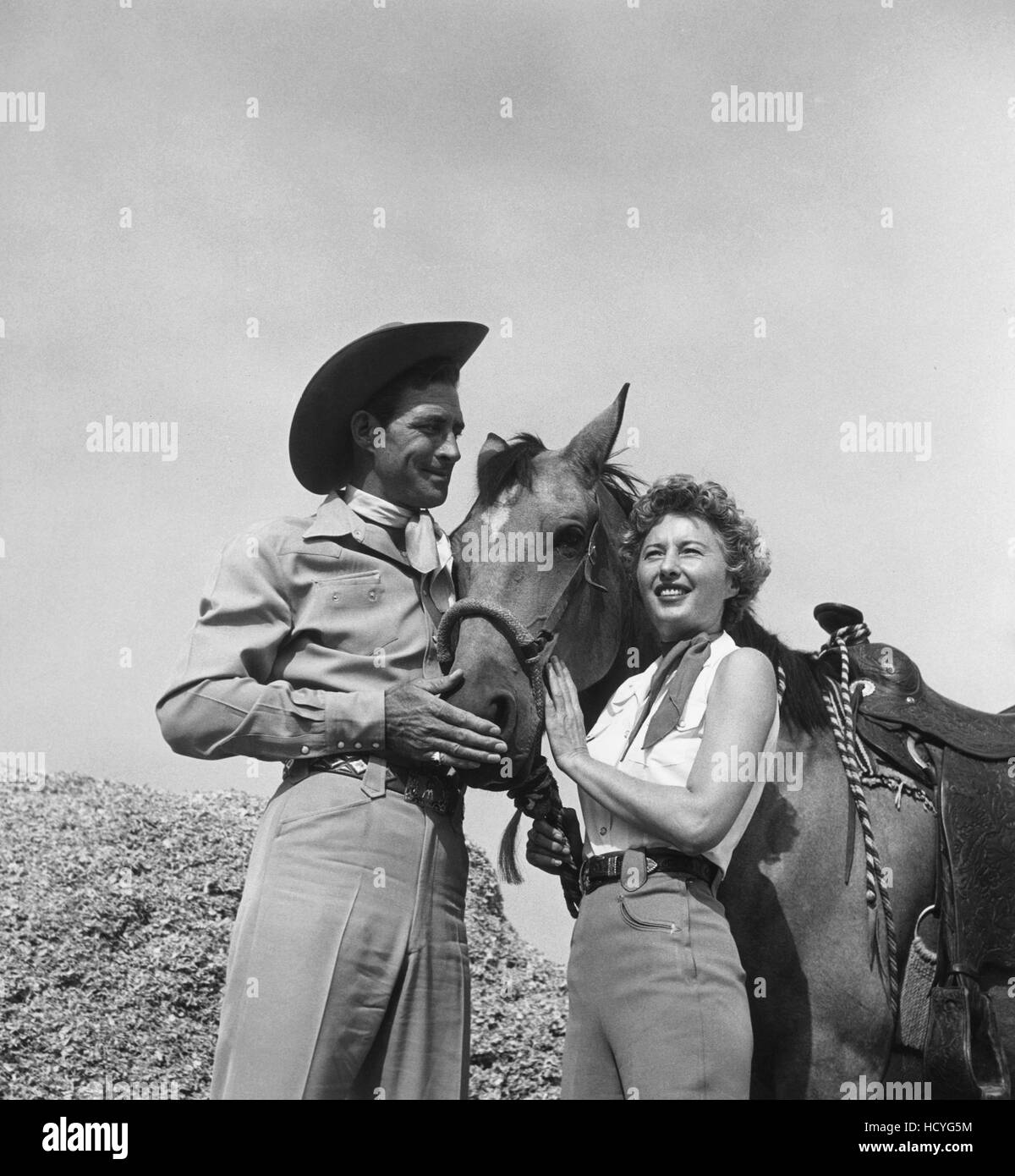 From left: Jock Mahoney, Barbara Stanwyck, early 1950s Stock Photo - Alamy