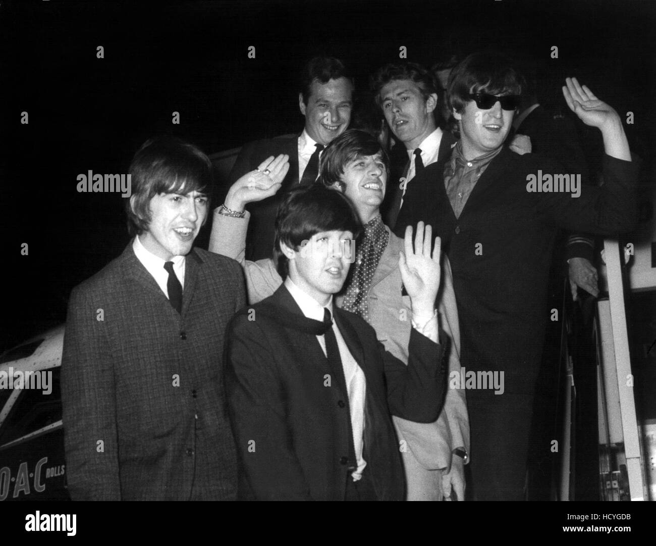 Brian Epstein, the Beatles returning to London Airport after their ...