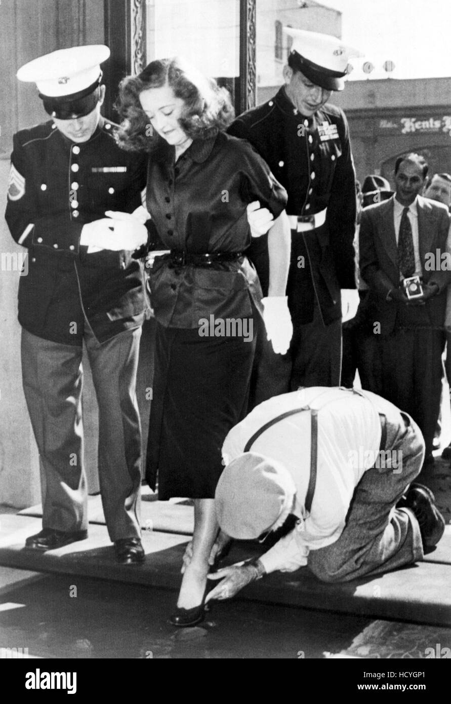 Marine sergeants JACK SPENCER and BERT NAVE help BETTE DAVIS imortalize ...