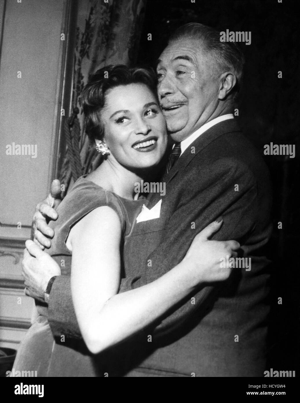 Bella Darvi, left, with Jack Warner, ca. early 1950s Stock Photo - Alamy