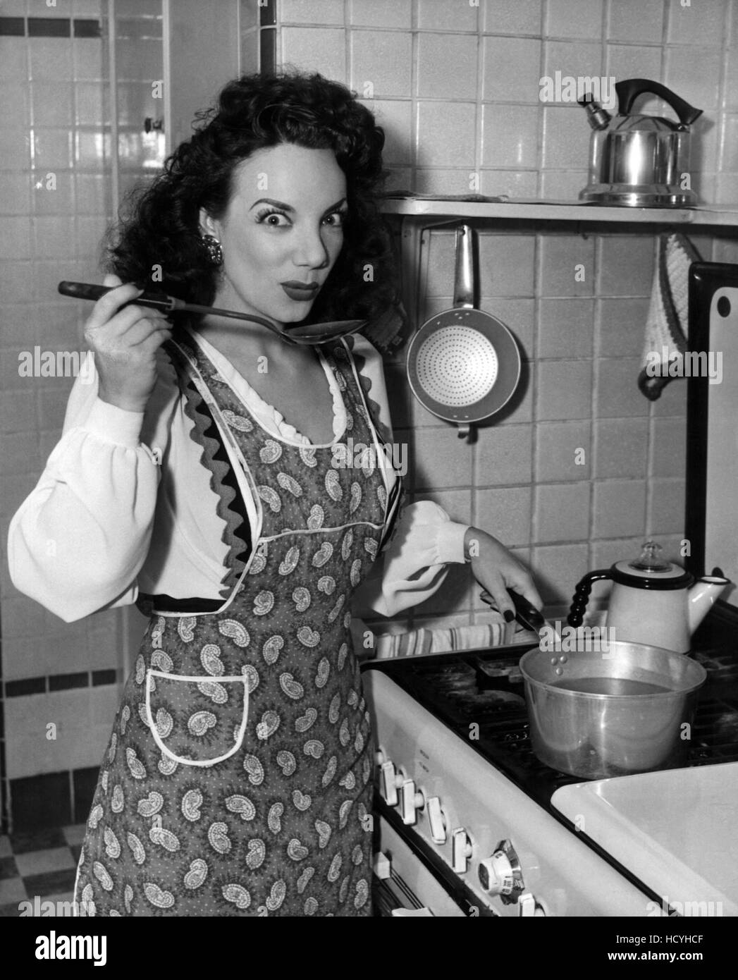 Carmen Miranda cooking at home, 1945 Stock Photo - Alamy