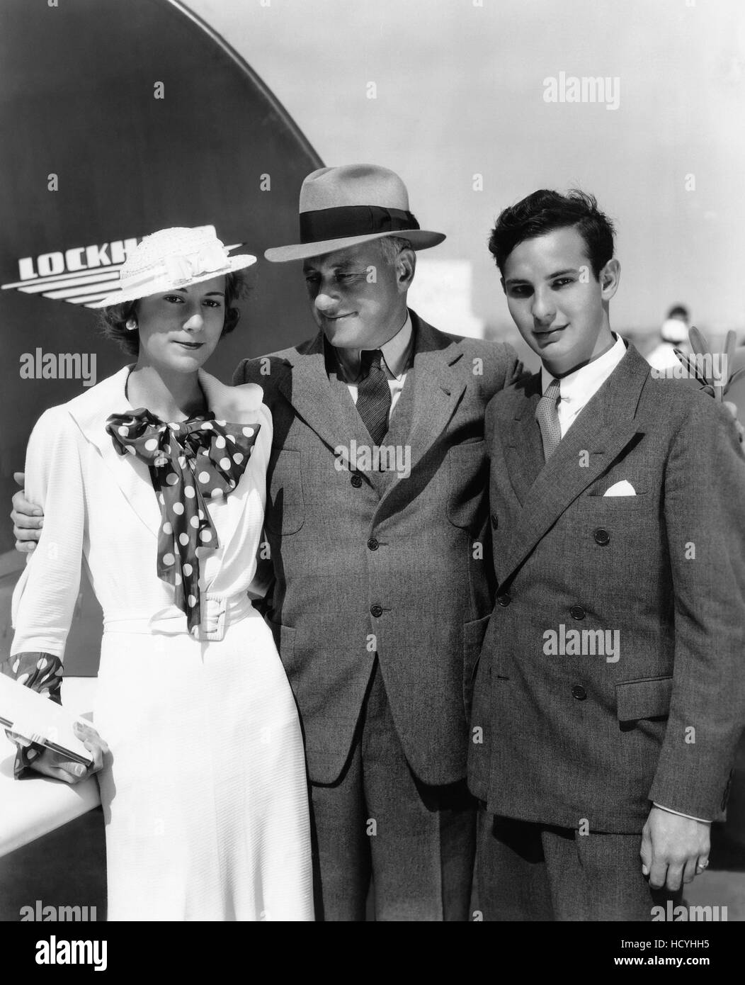 Cecil B. DeMille, center, with son John DeMille and John's fiancee ...