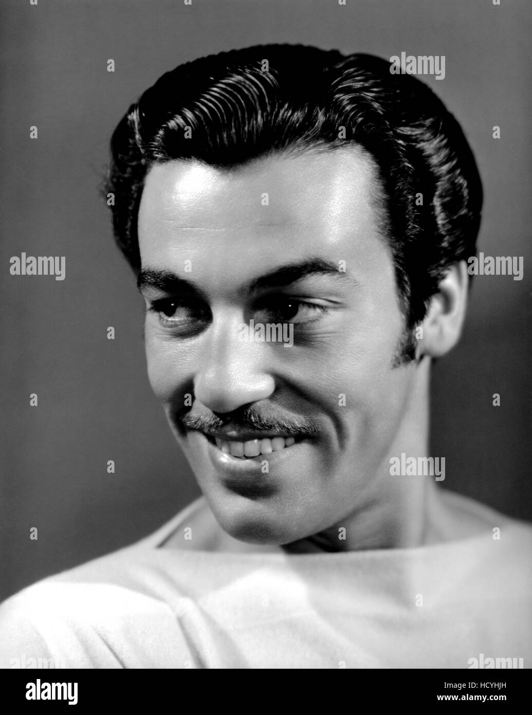 Cesar Romero, ca. 1930s Stock Photo - Alamy